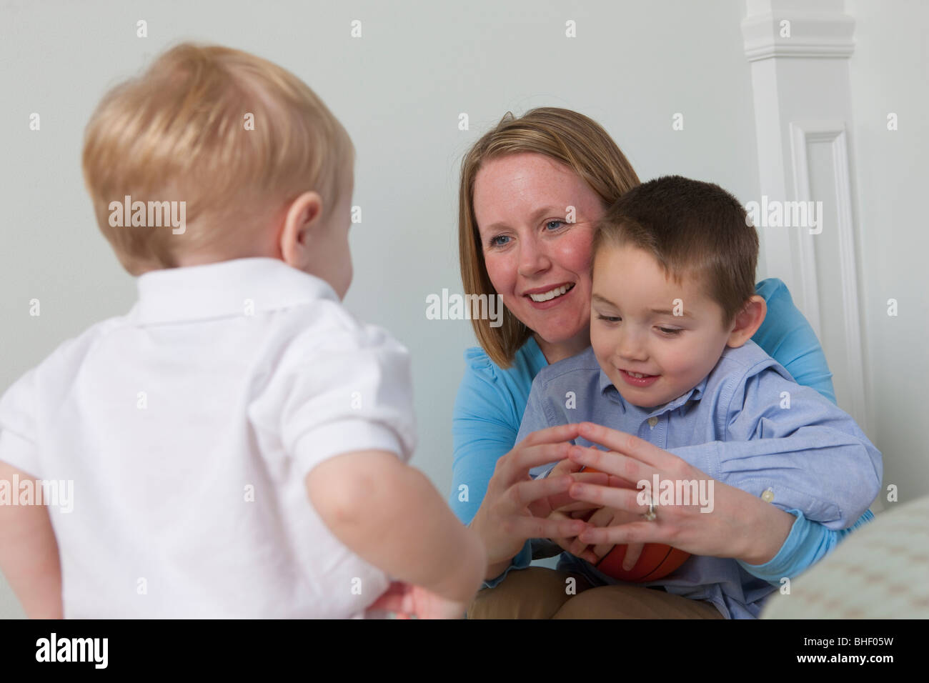 Woman signing the word 'Ball' in American Sign Language while ...