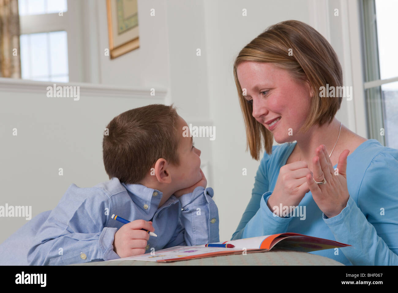 Teaching sign language hi-res stock photography and images - Alamy