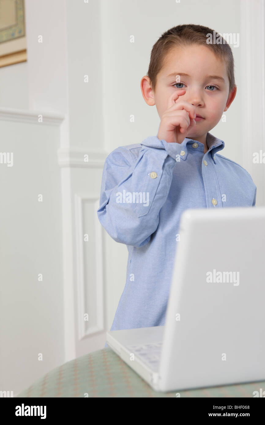 Boy signing the letter 'X' in American Sign Language Stock Photo - Alamy