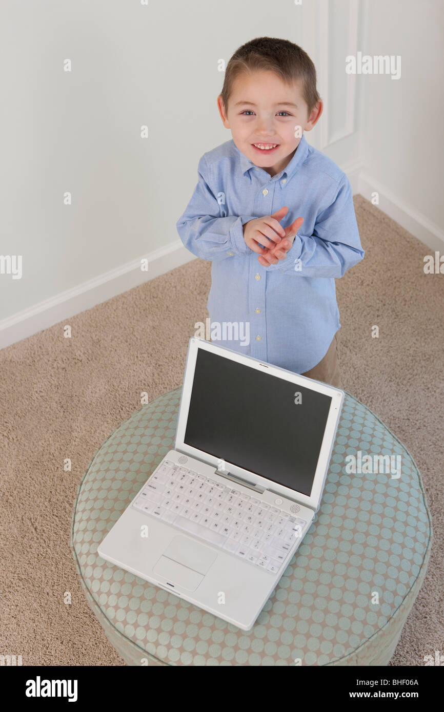 Boy signing the word 'Calculator' in American Sign Language Stock Photo ...