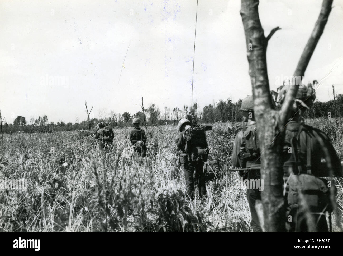 Rifleman Infantrymen walk in a column during a patrol. Vietnam War 1st ...