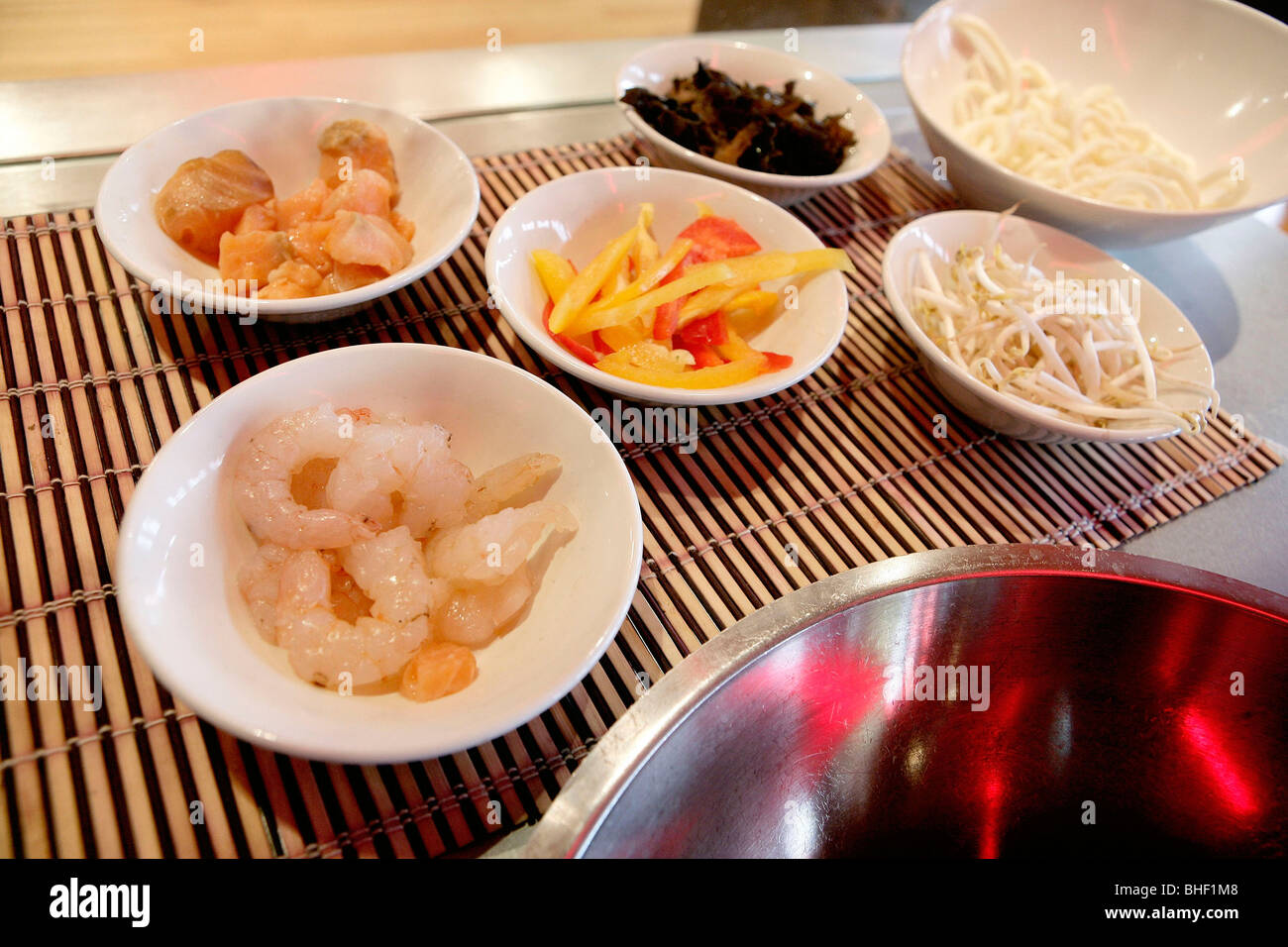 Gastronomy : Dish prepared in a wok Stock Photo - Alamy