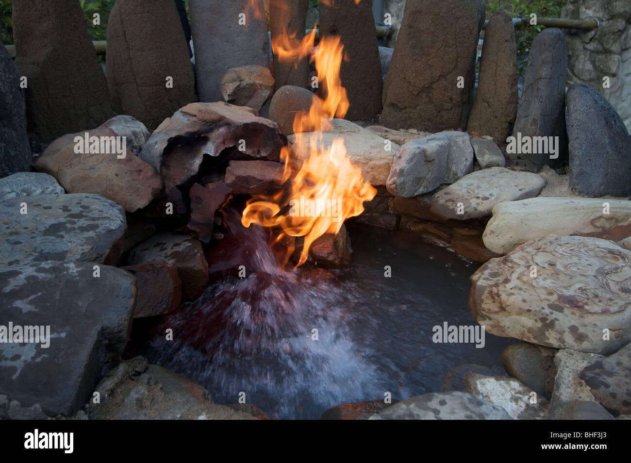 gas from hot springs in fire Stock Photo - Alamy
