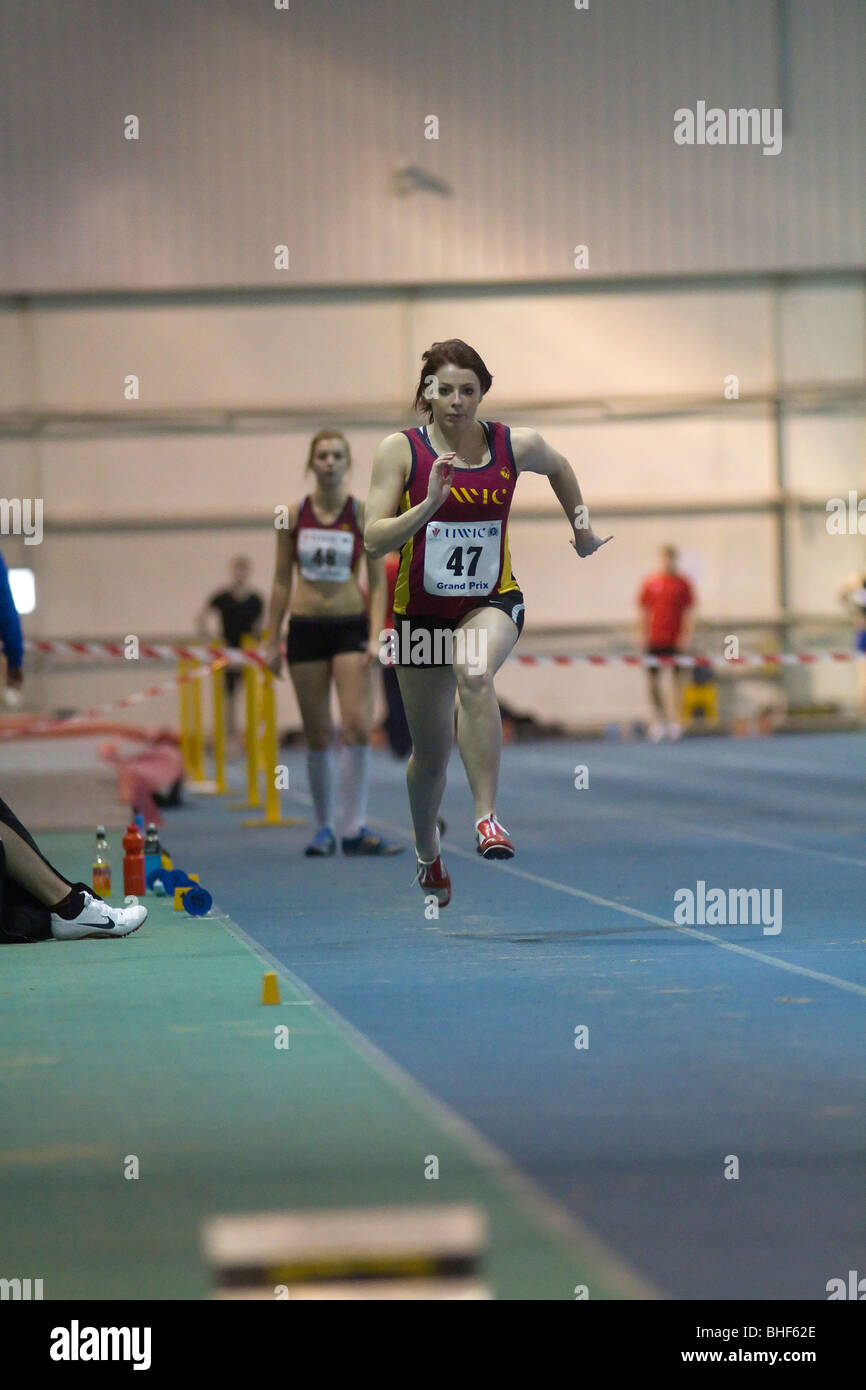 Female athlete competing in the triple jump/long jump Stock Photo - Alamy