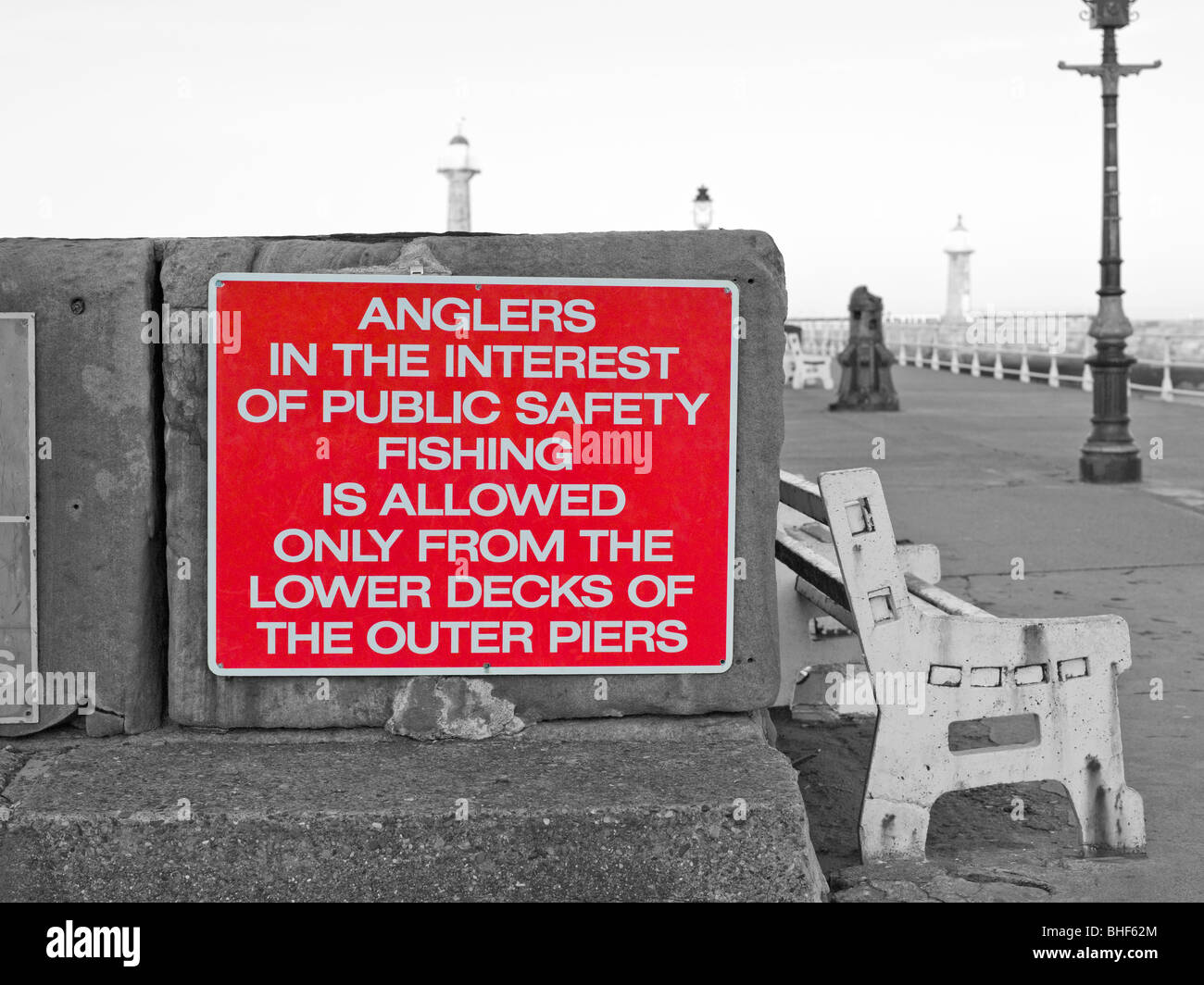 Red warning sign to anglers Whitby Harbour North Yorkshire England UK ...