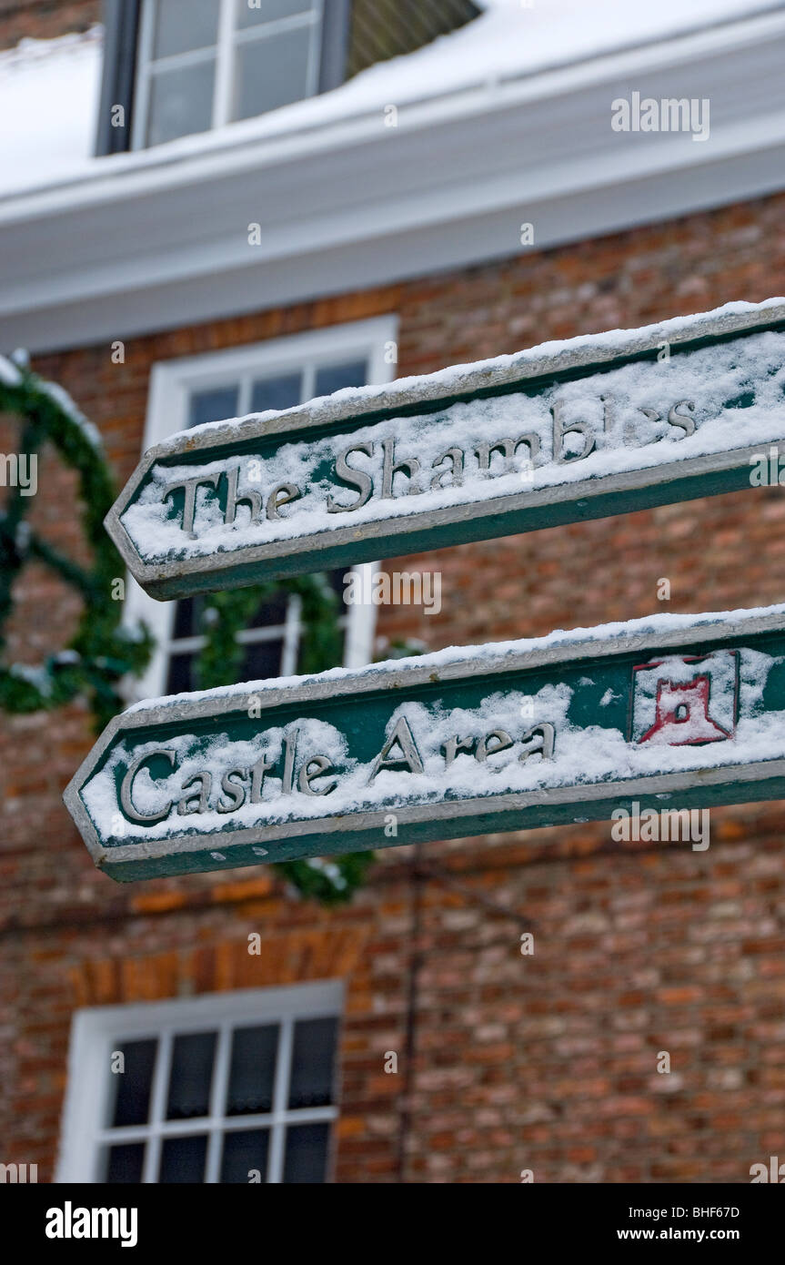 Close up of tourist information signs sign covered in snow York North ...
