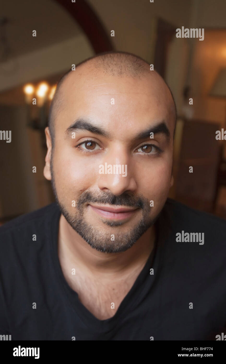 Close up of smiling mixed race man Stock Photo - Alamy