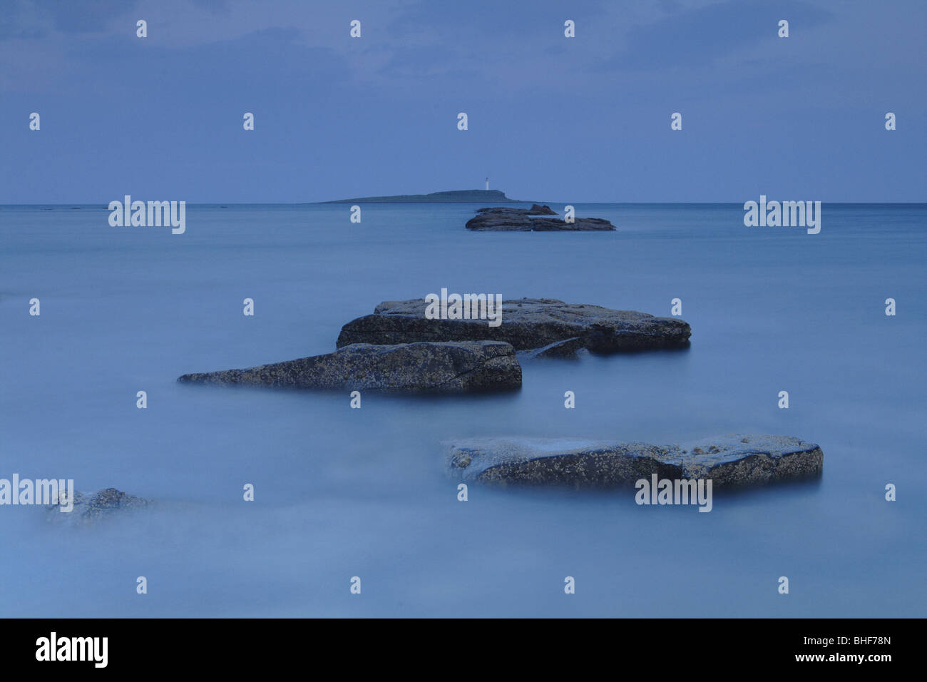 Pladda Lighthouse at dusk from Kildonan Shore on the Island of Arran ...