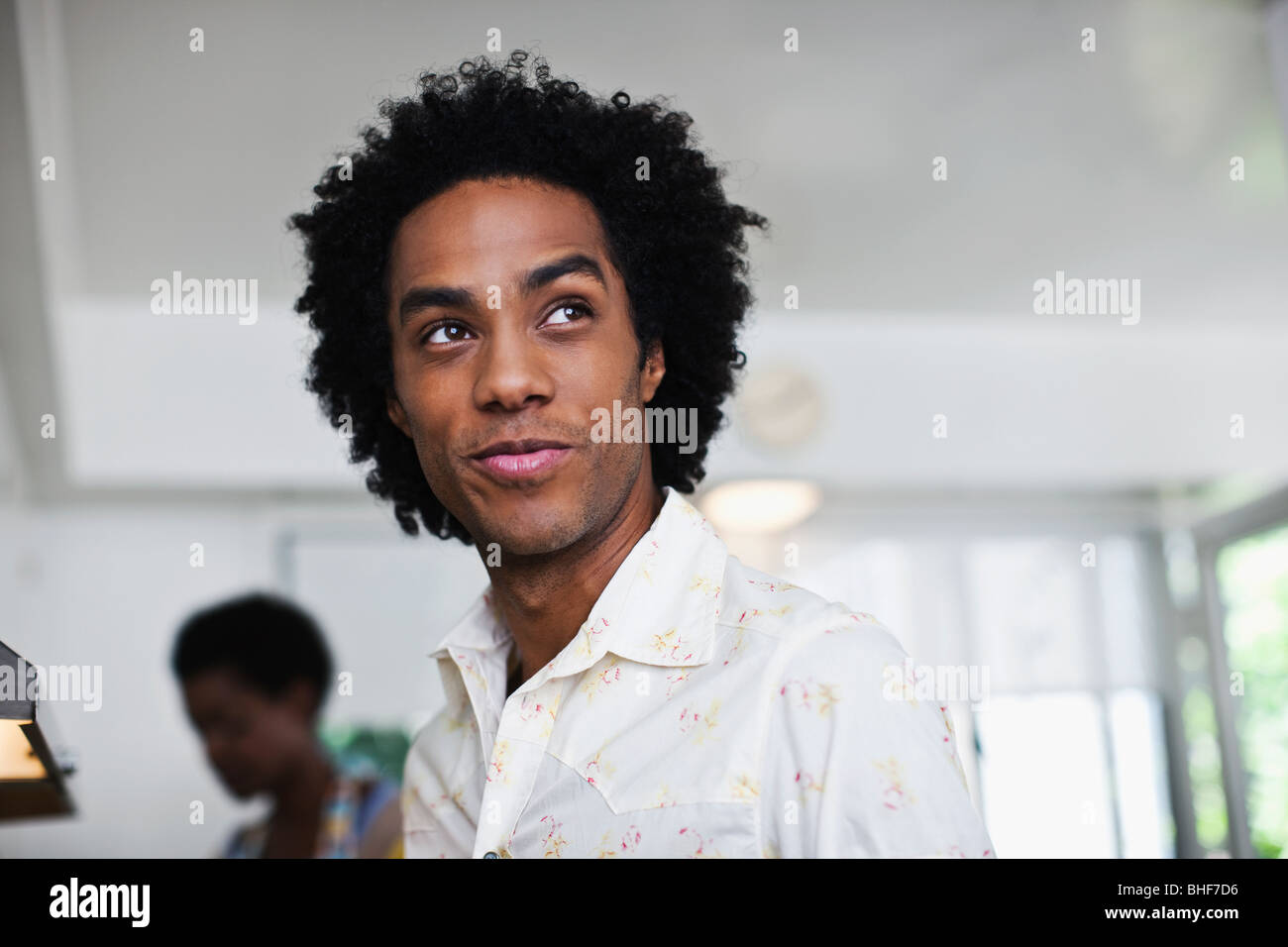 Mixed race man smiling Stock Photo - Alamy