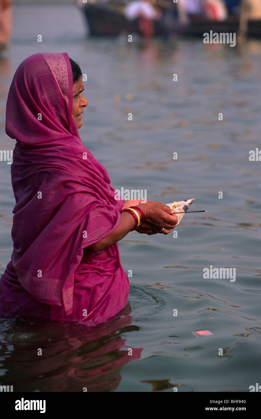 Indian woman bathing in river hi-res stock photography and images - Alamy