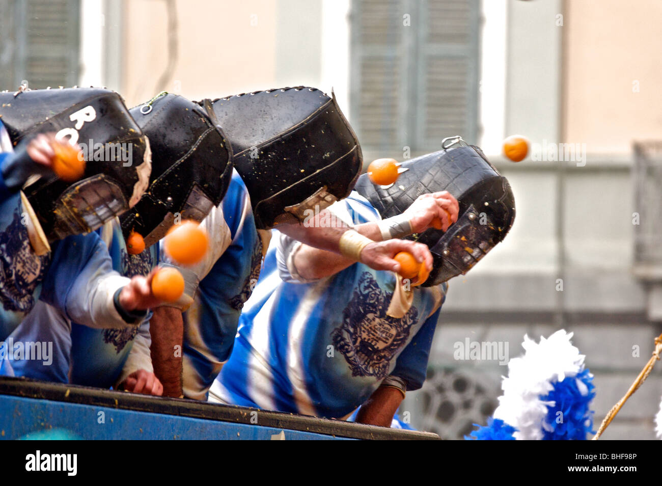 The Battle of Oranges, Ivrea Carnival ­ fighting side by side Stock ...