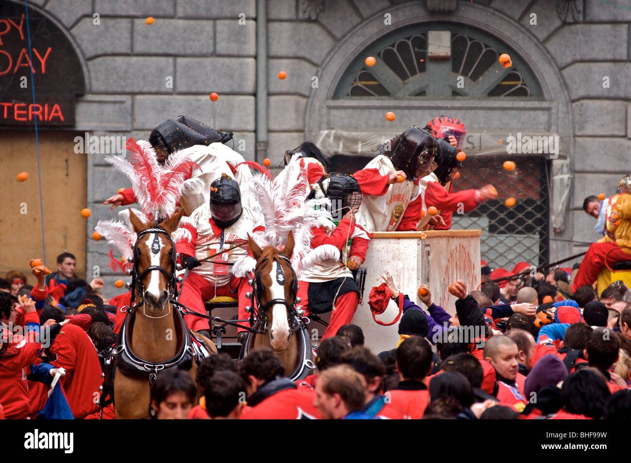 The Battle of Oranges, Ivrea Carnival - a clear view of a carriage ...