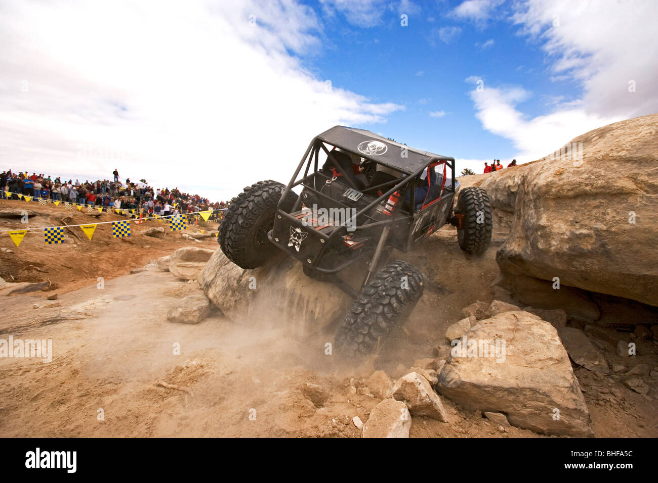 View towards a racing car which is driving over a rock at the Rock ...