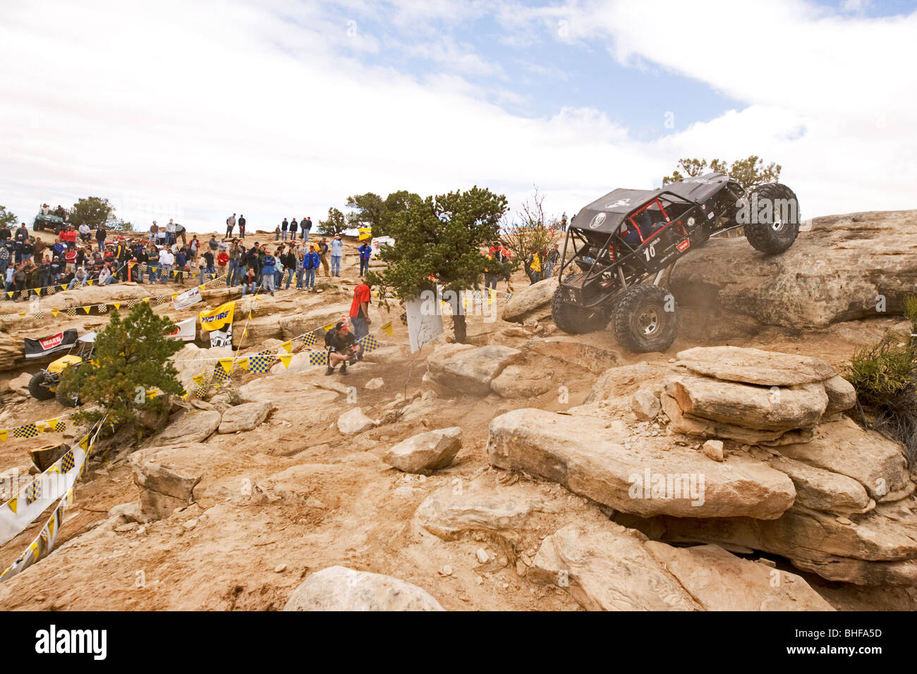 View towards a racing car which is driving over a rock at the Rock ...
