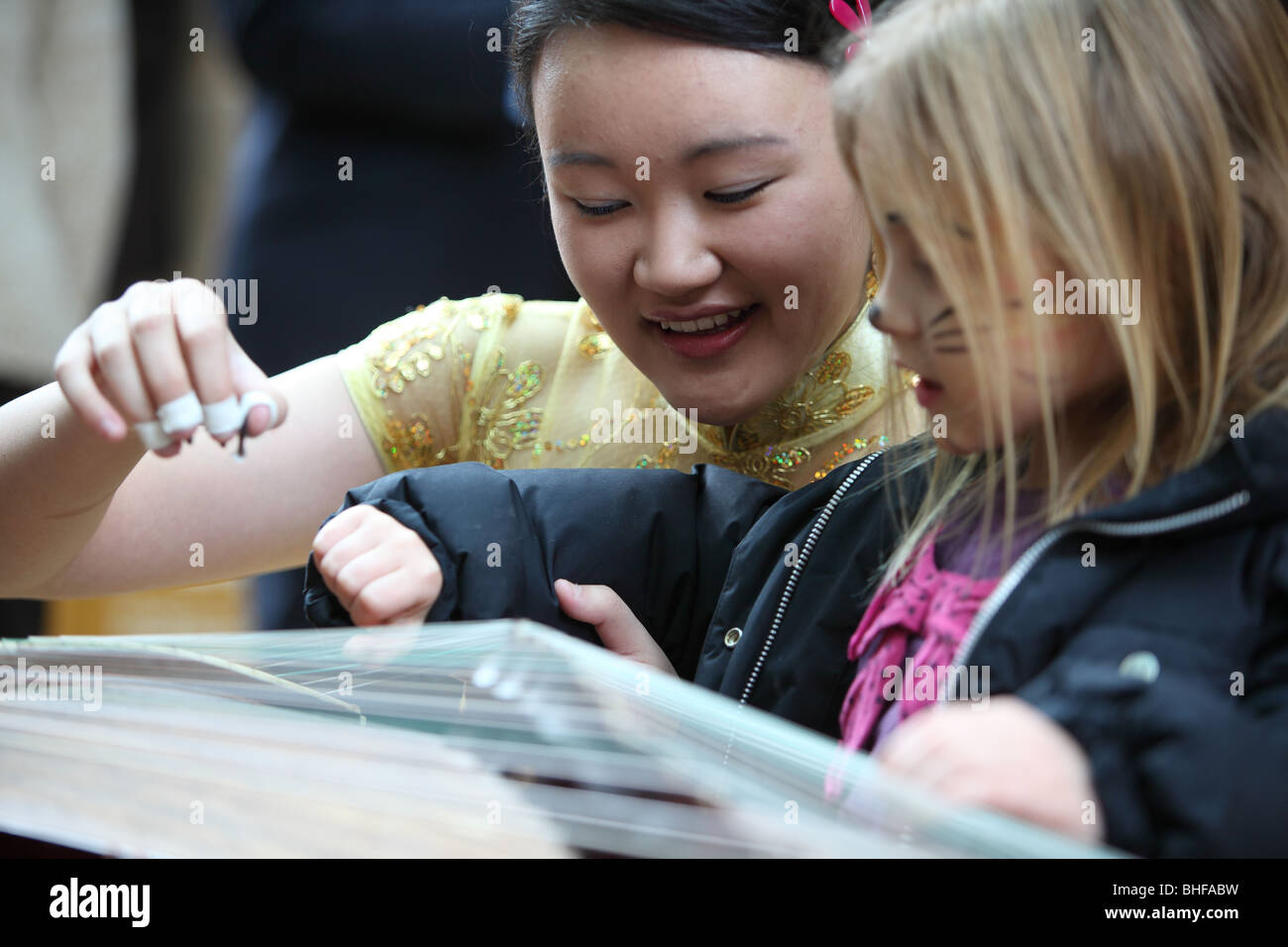 Kuzhan Chinese musician girl China town Asia show performance ...