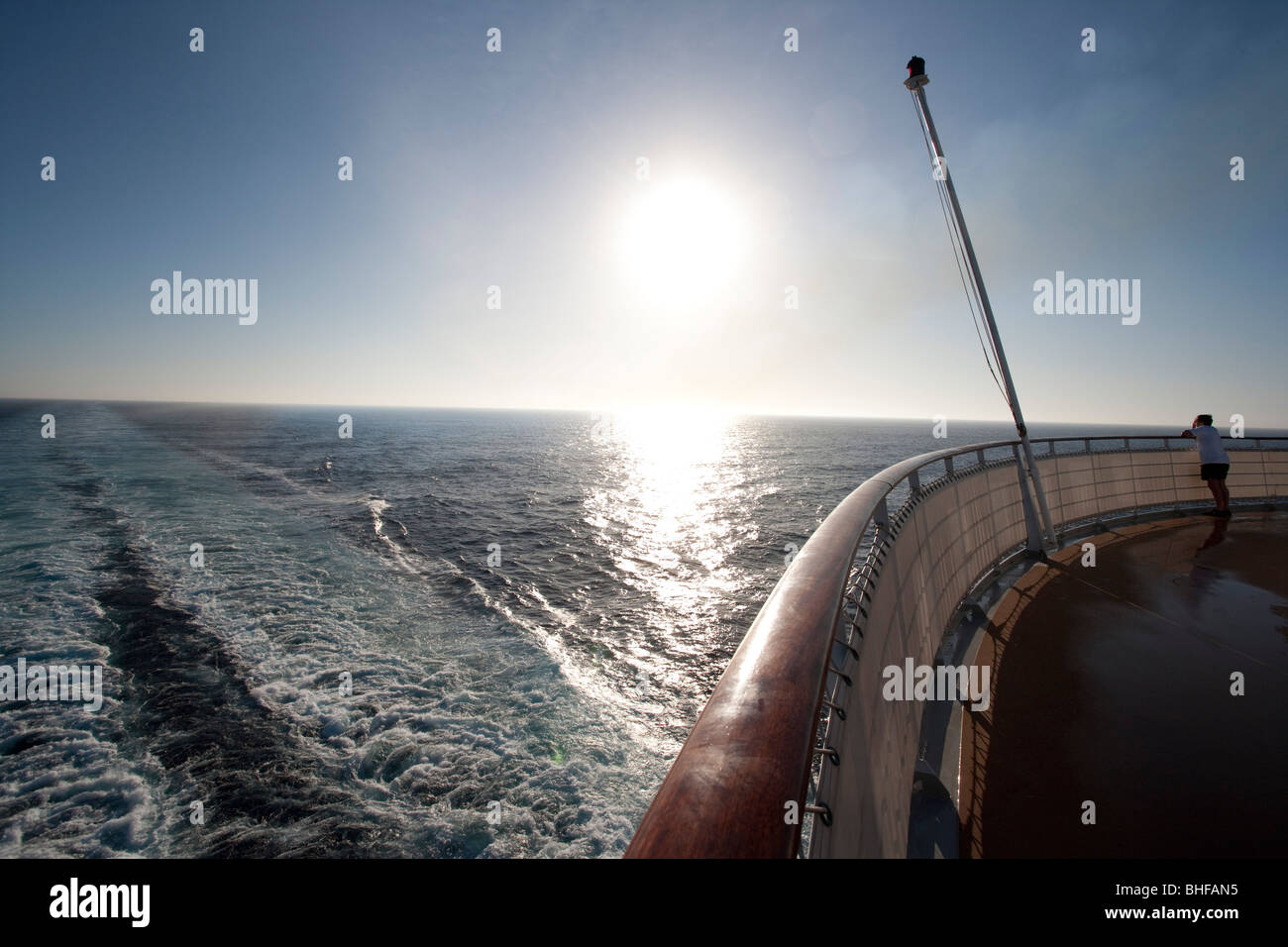 Cruise ship Queen Mary 2 stern with blackwash, flagpole, railing and ...