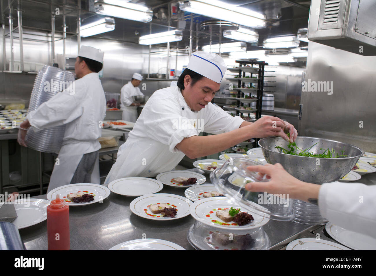 Chefs preparing the starter in the galley, ships kitchen, cruise liner, Queen Mary 2 Stock Photo ...
