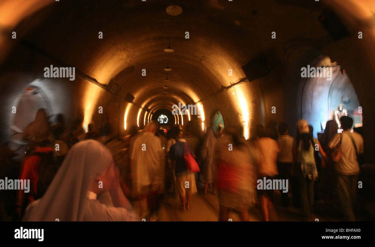 Tourists walking through the Malinta Tunnel, Corregidor Island, Manila ...