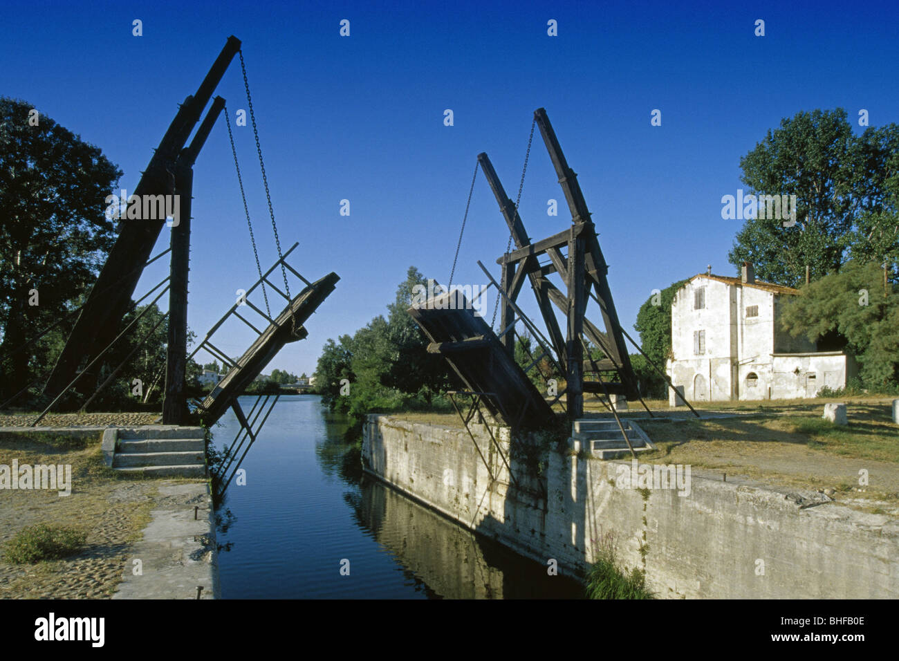 Bascule bridge above a river under blue sky, Bouches-du-Rhone, Provence ...