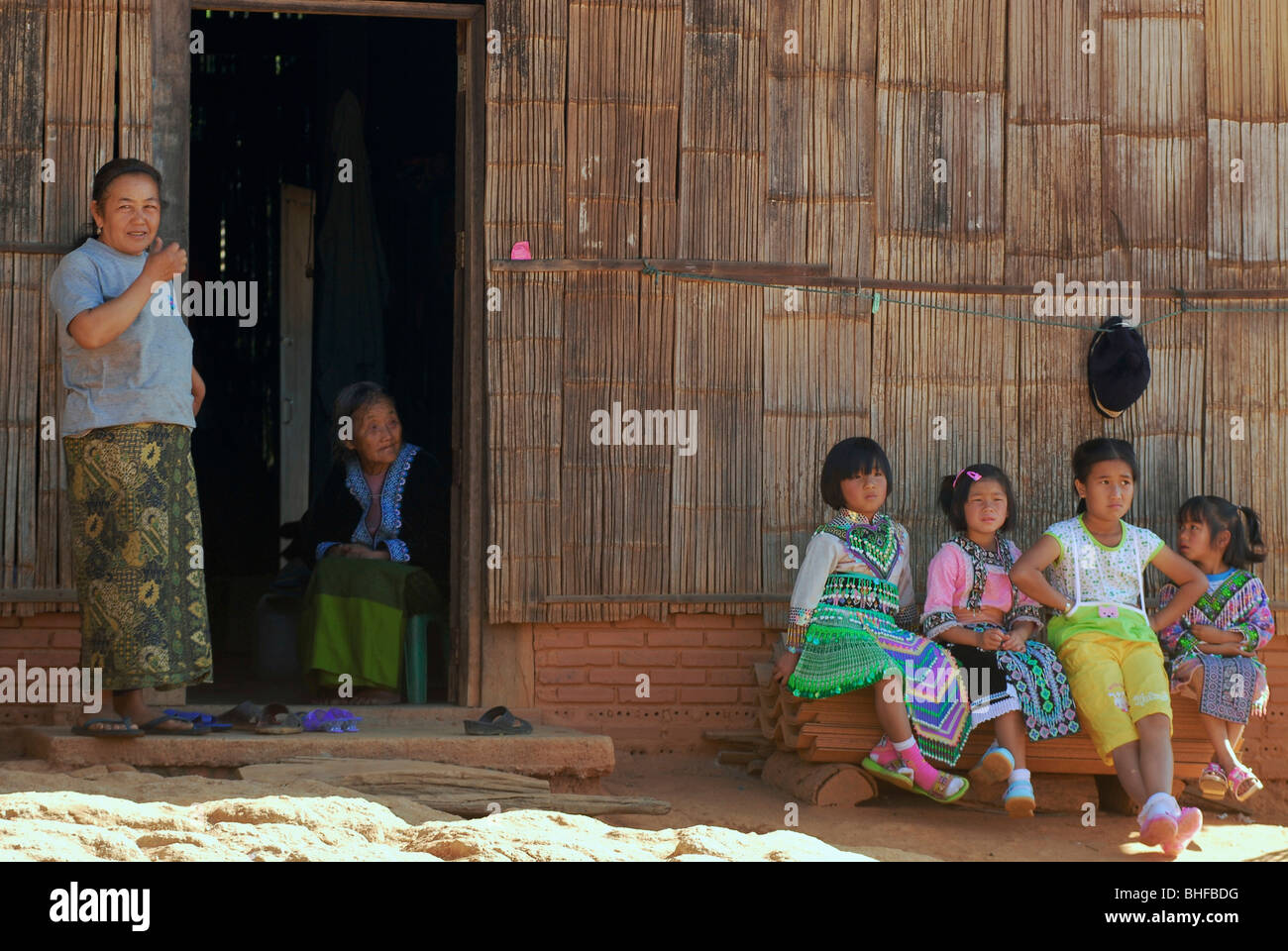 Hmong women and children dressed in traditional costumes, Mae Rim ...