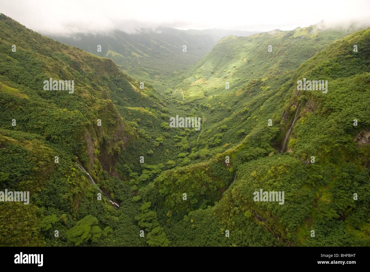 Aerial view of green landscape with waterfalls, Nuku Hiva ...