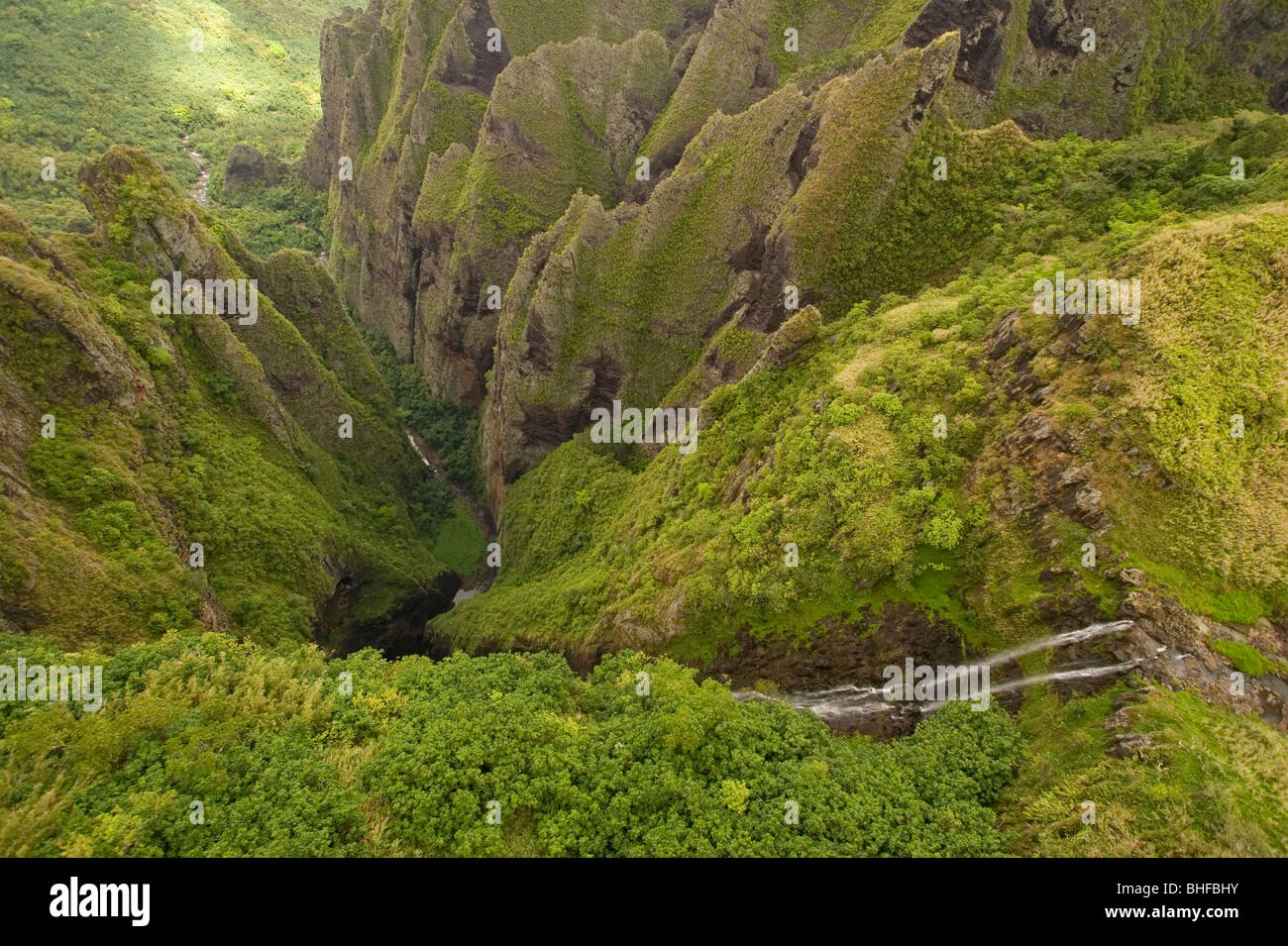 Aerial view of green landscape with waterfalls, Nuku Hiva ...