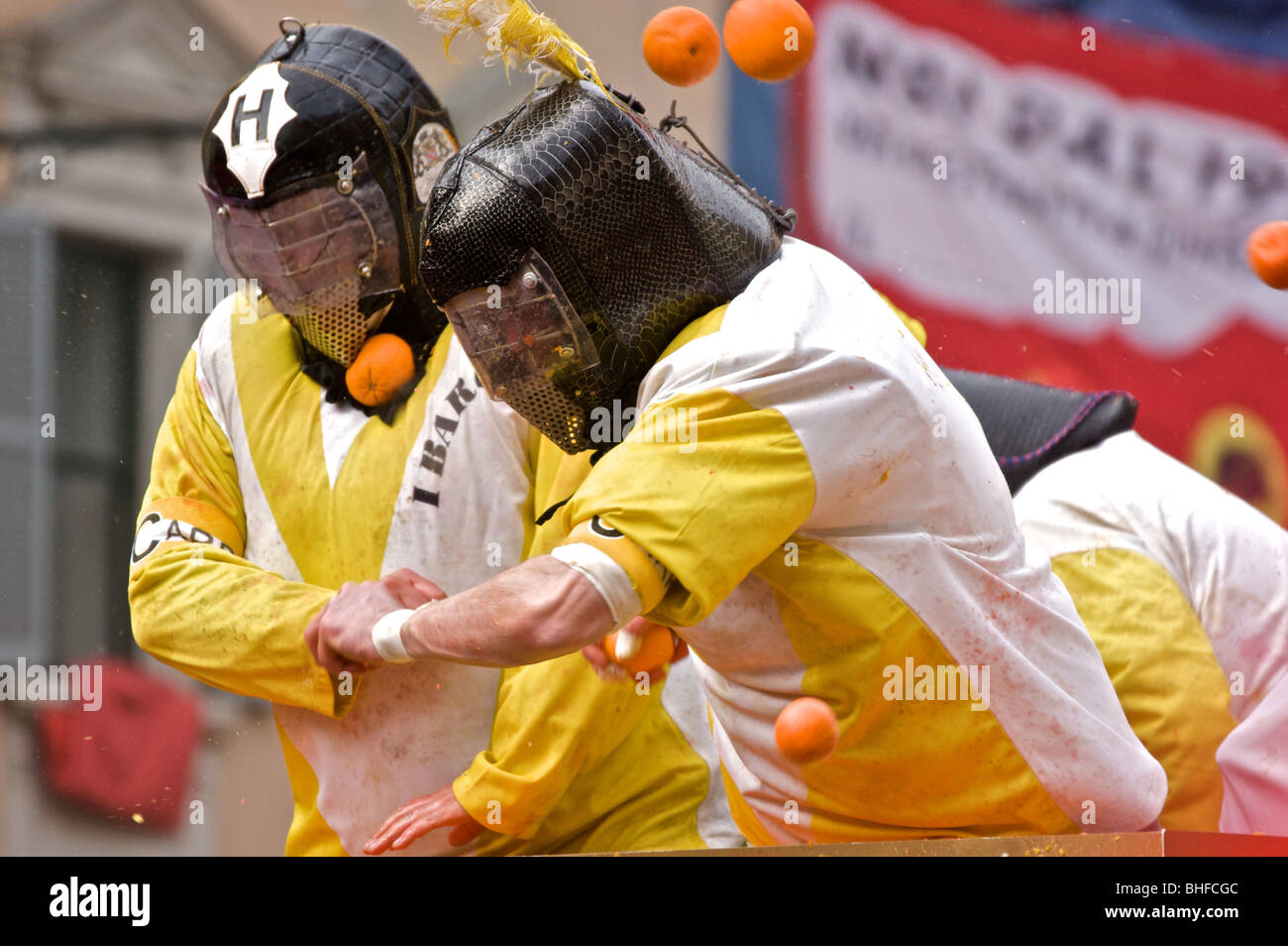 The Battle of Oranges, Ivrea Carnival - fighting together - two of the ...