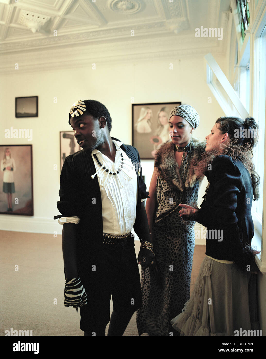 Fashion designer L. Jacobs, singer Sheba W. and singer from Ruanda at a ...