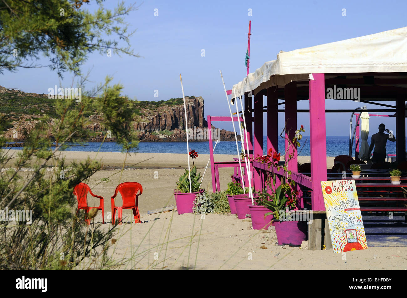 Beachside cafe in the sunlight, Isola di San Pietro, South Sardinia ...