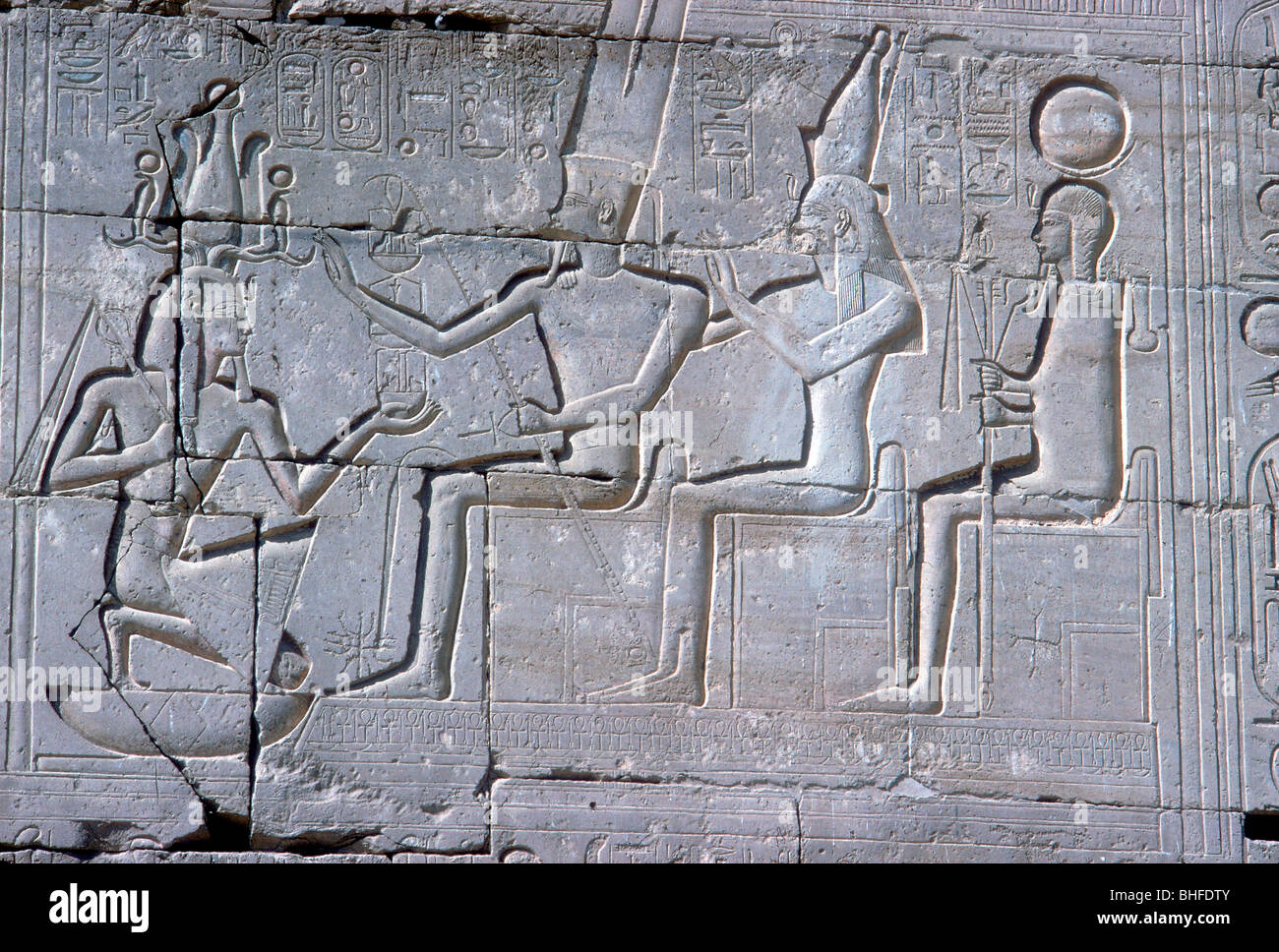 Relief of Rameses II kneeling before Amun Mut & Khons, The Ramesseum ...