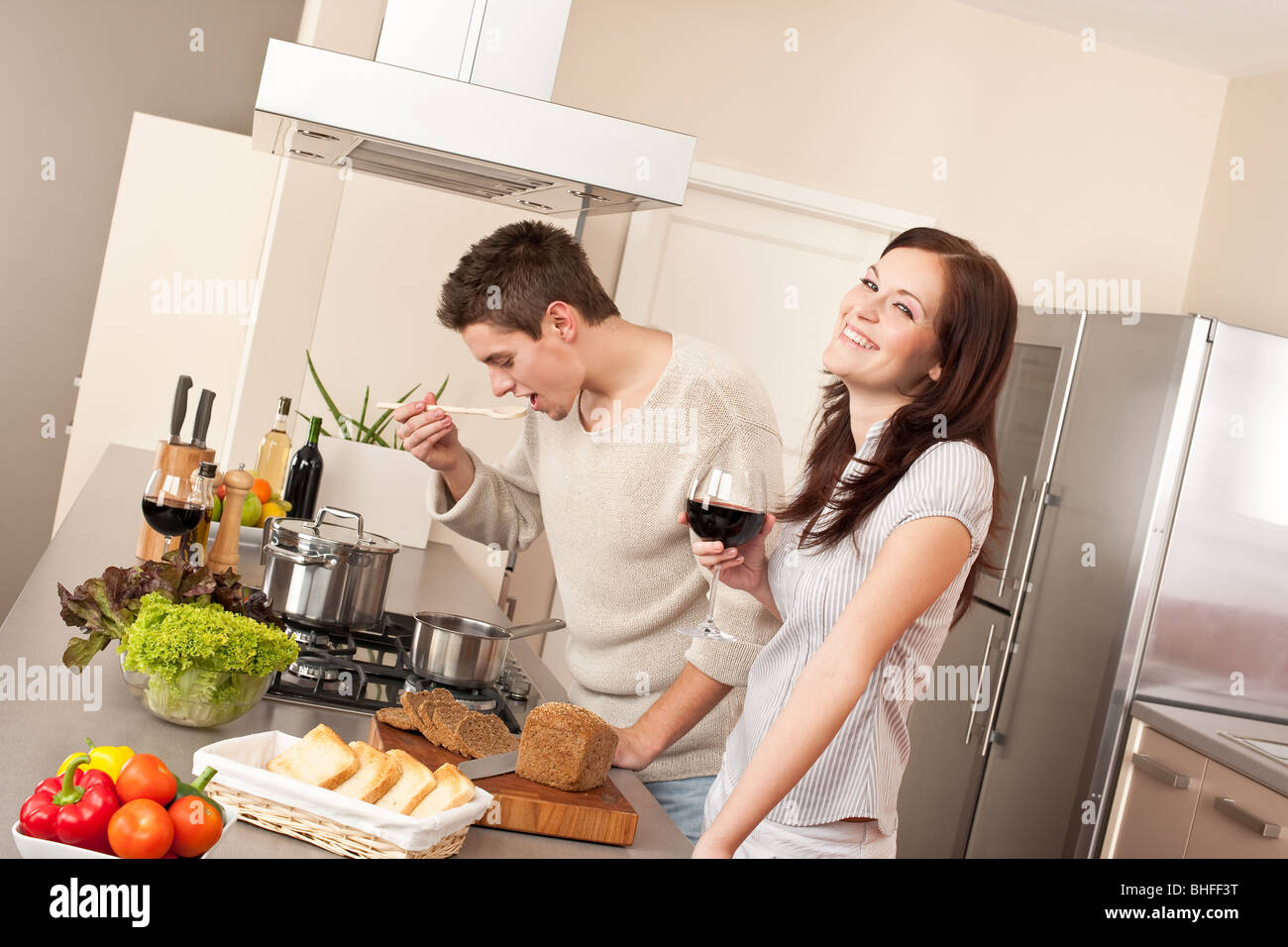 Couple wine cooking hi-res stock photography and images - Alamy