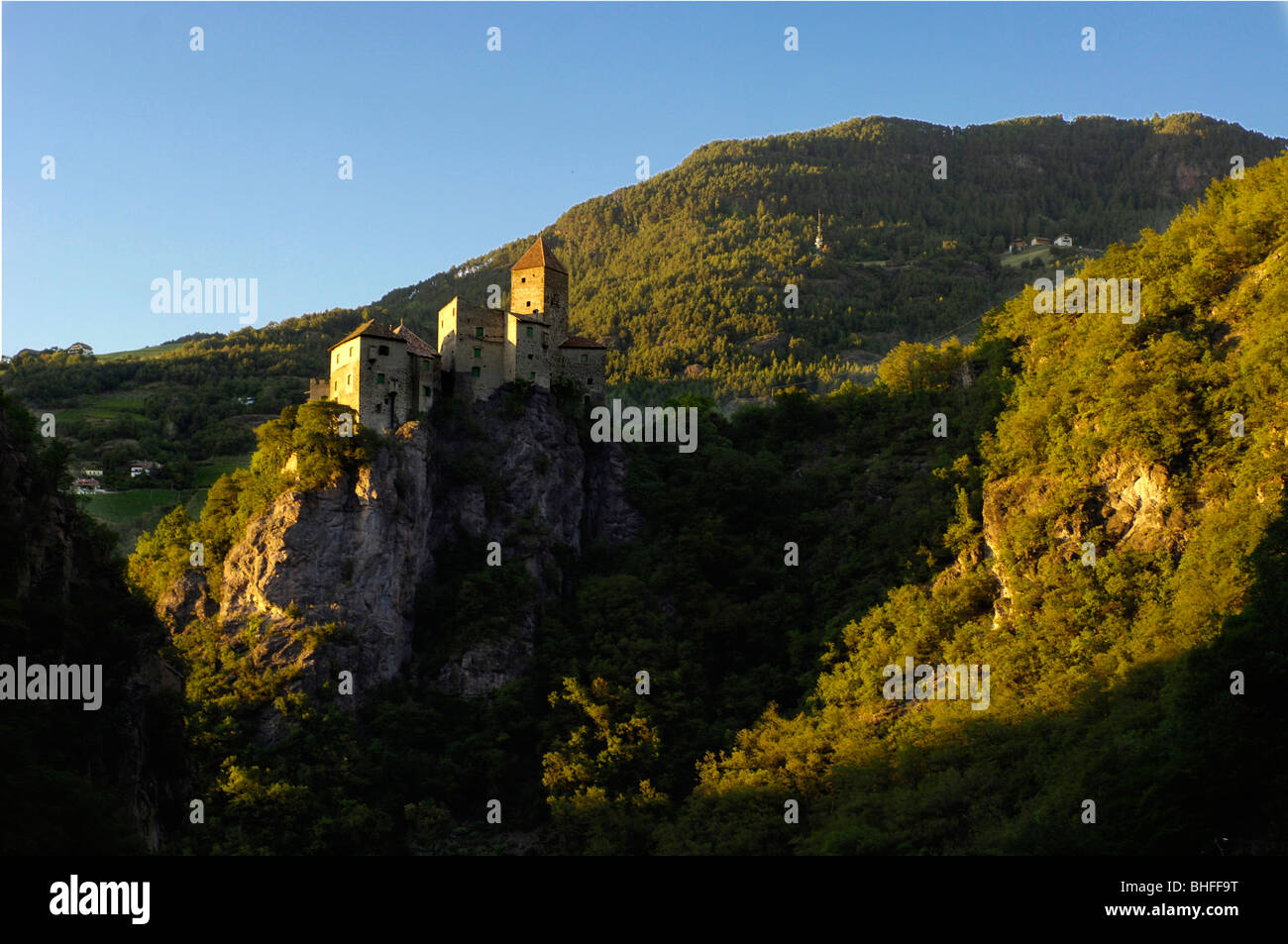 Karneid castle in the light of the evening sun, Valle Isarco, South ...