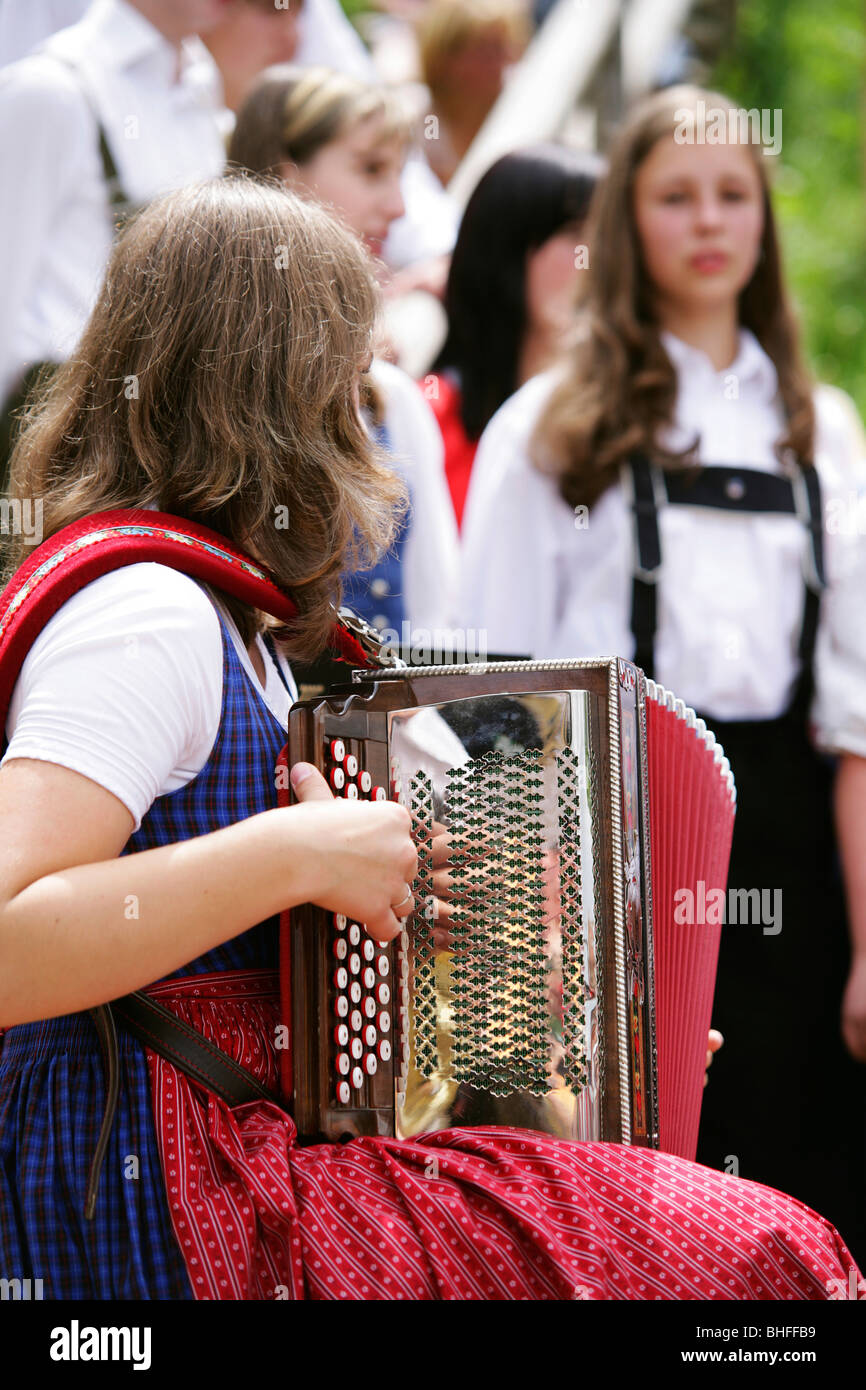 Woman playing harmonica hi-res stock photography and images - Alamy