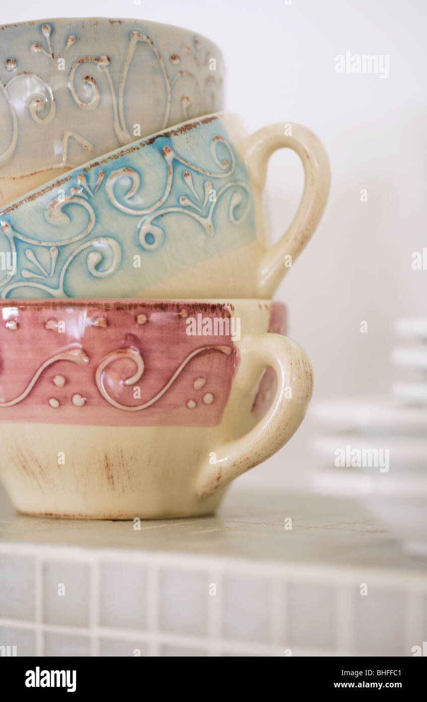 Stack of three cups, close-up Stock Photo - Alamy