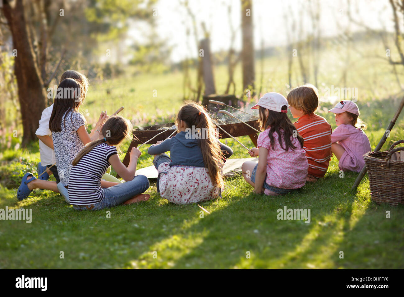 Children barbecueing sausages, Munsing, Bavaria, Germany Stock Photo ...