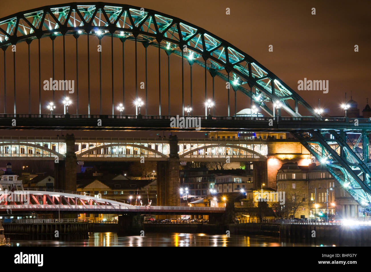 Night view of the Bridges crossing the River Tyne from Newcastle to ...
