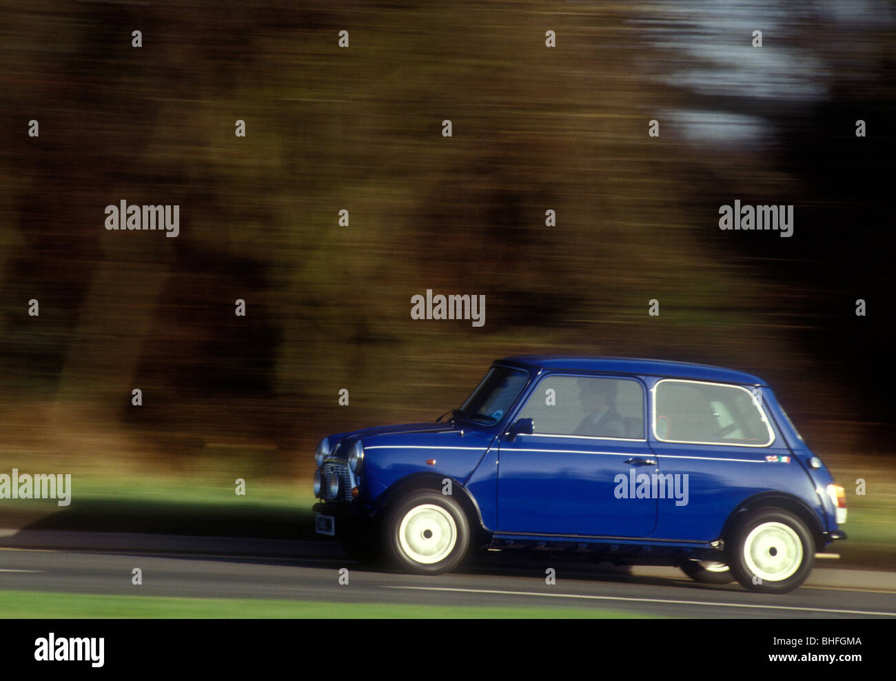 Rover Mini driving at speed Stock Photo - Alamy