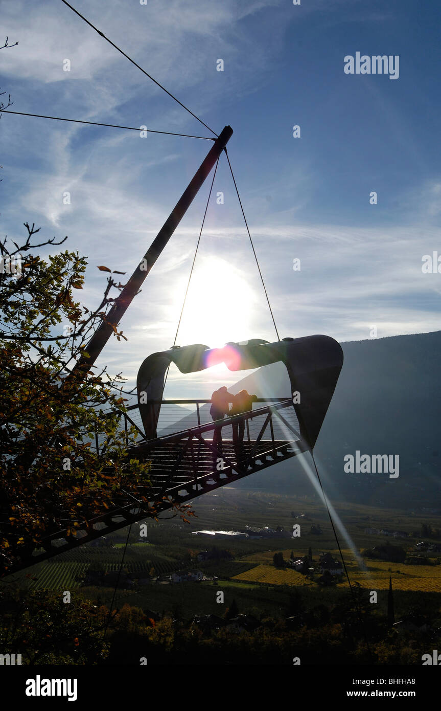 People on a modern viewing platform in the sunlight, Merano, Val ...
