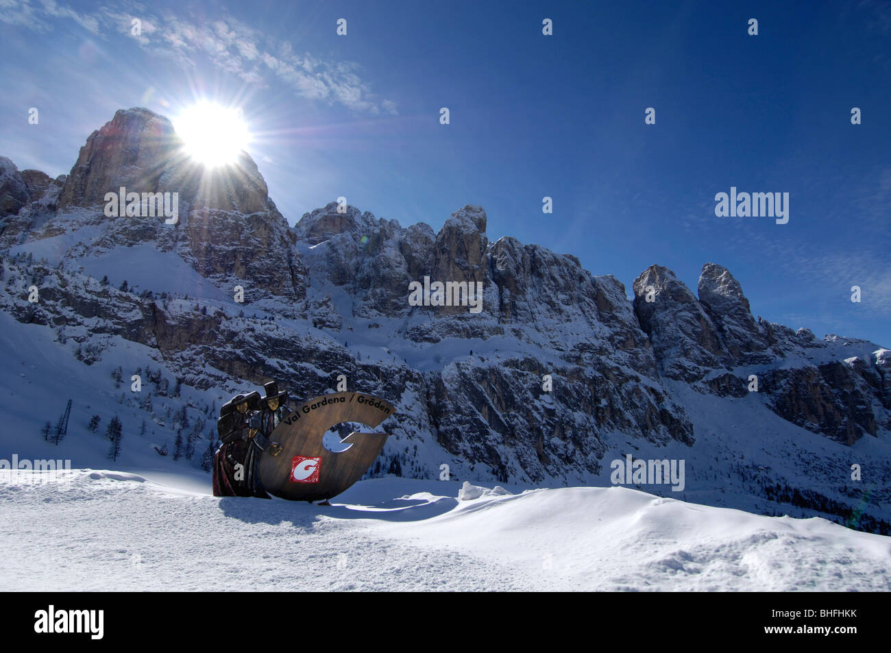 Sculpture in the snow in front of mountains, Dolomites, South Tyrol ...