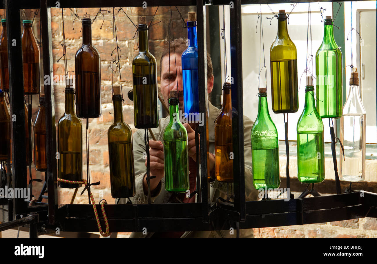 Playing a bottle organ / street organ Stock Photo - Alamy