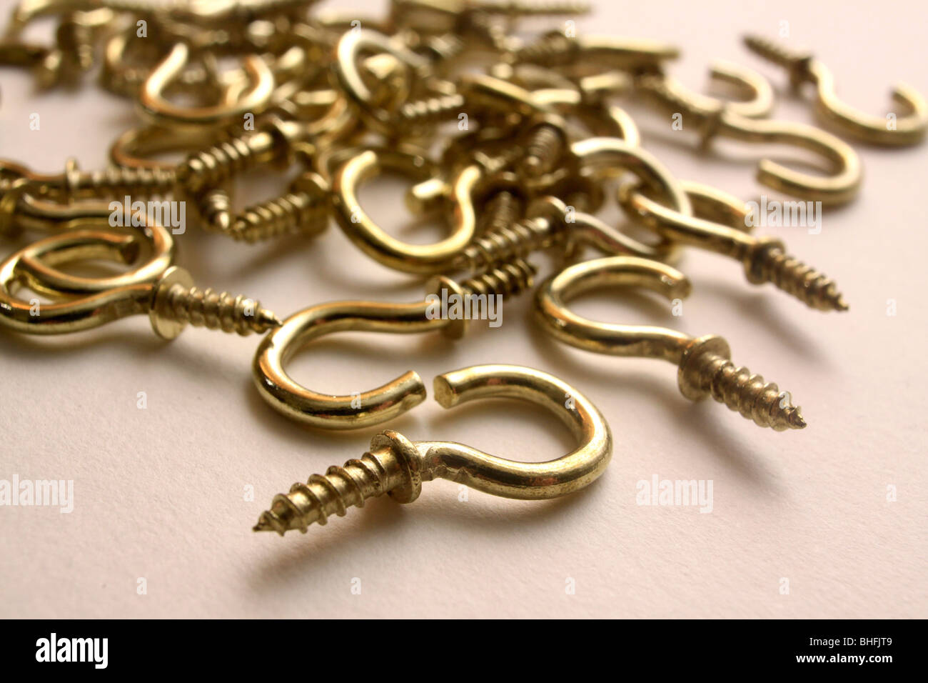 Brass coloured Screw Hooks Stock Photo - Alamy