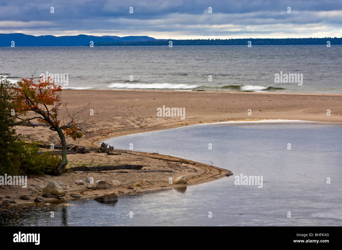 Sand bars and boulders at mouth of the Sand River with Lake Superior ...