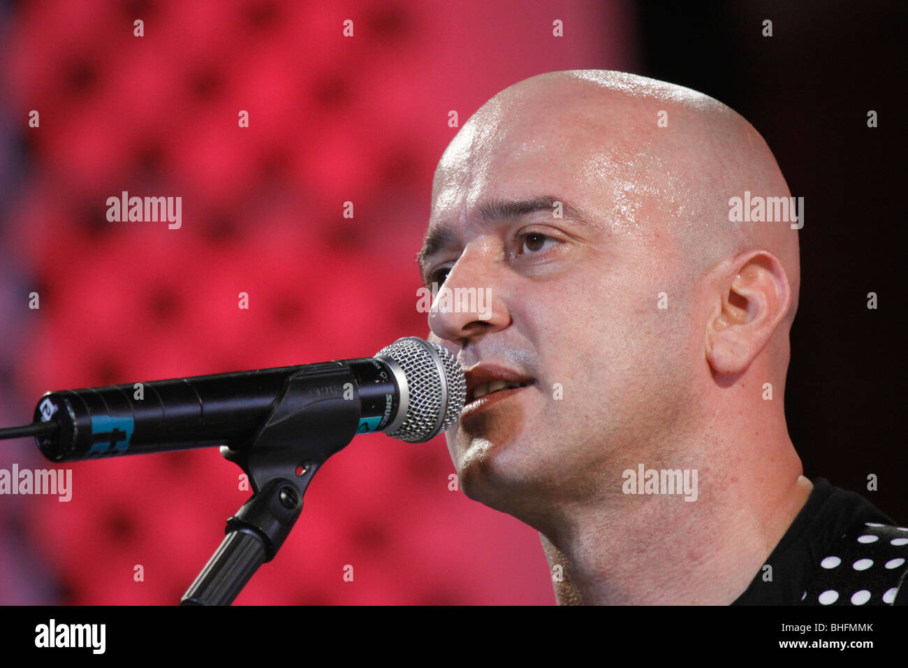 Bald singer hi-res stock photography and images - Alamy