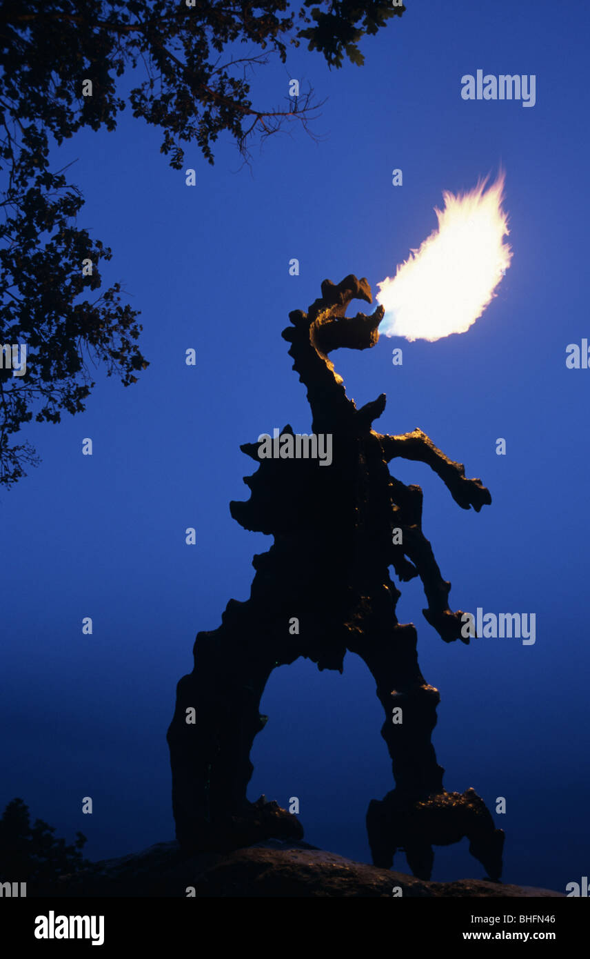 Statue of mythical dragon breathing fire, Krakow, Poland Stock Photo ...