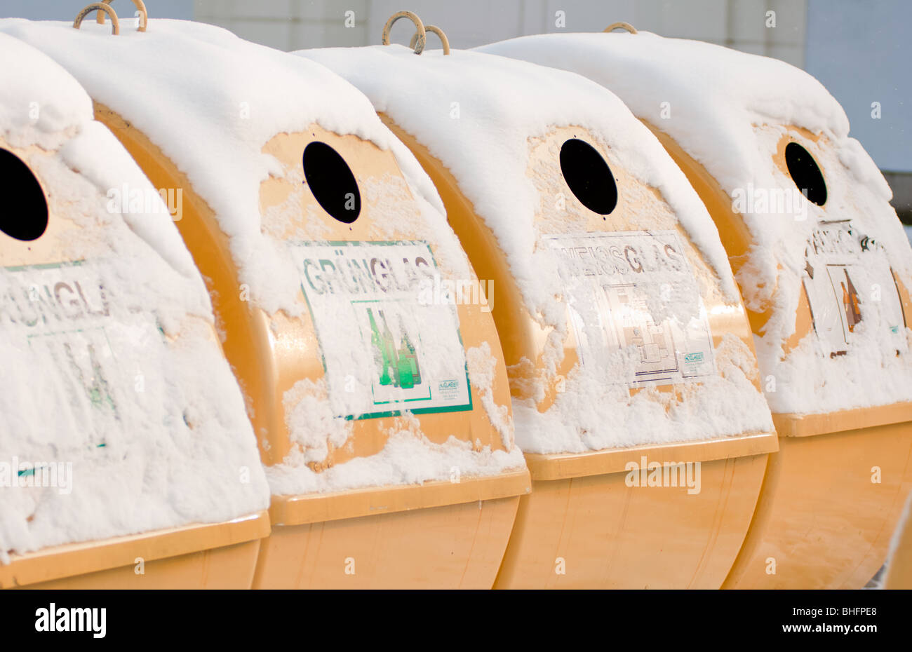 Recycle bins covered in snow Stock Photo - Alamy