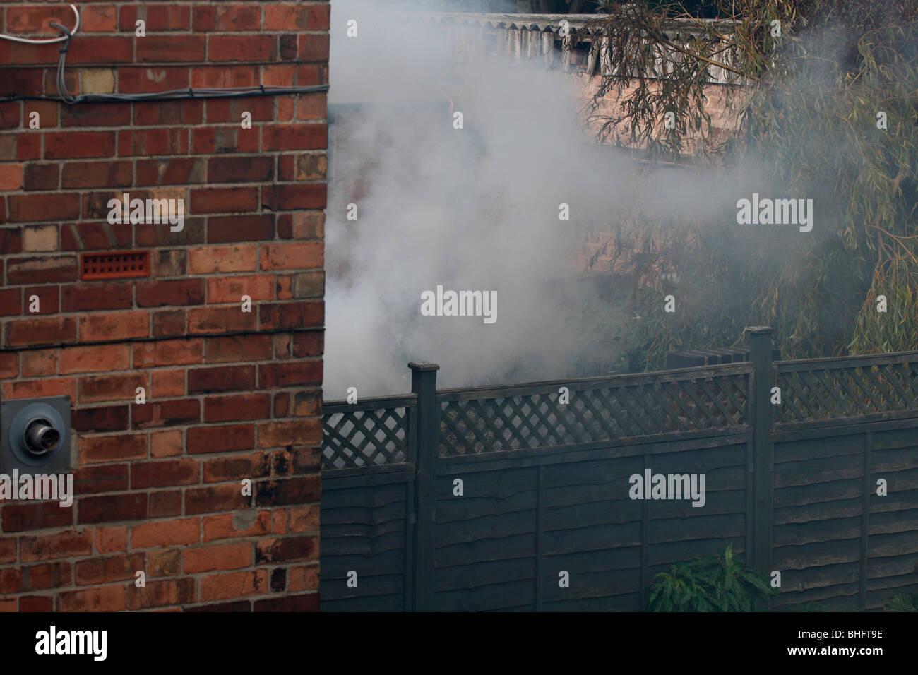 Smoke from a garden fire starts to spread all over neighbouring gardens ...