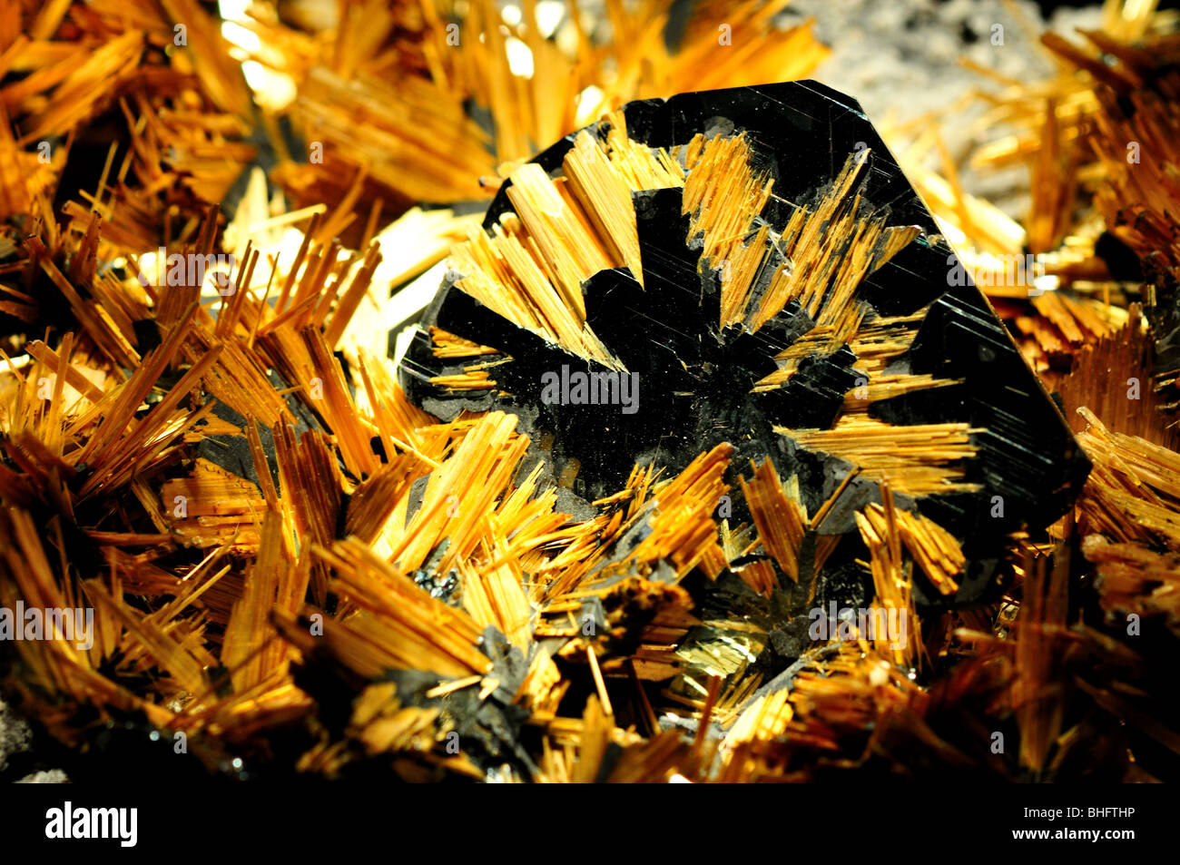 Rutile (TiO2) crystals growing on hematite (Fe2O3 Stock Photo - Alamy