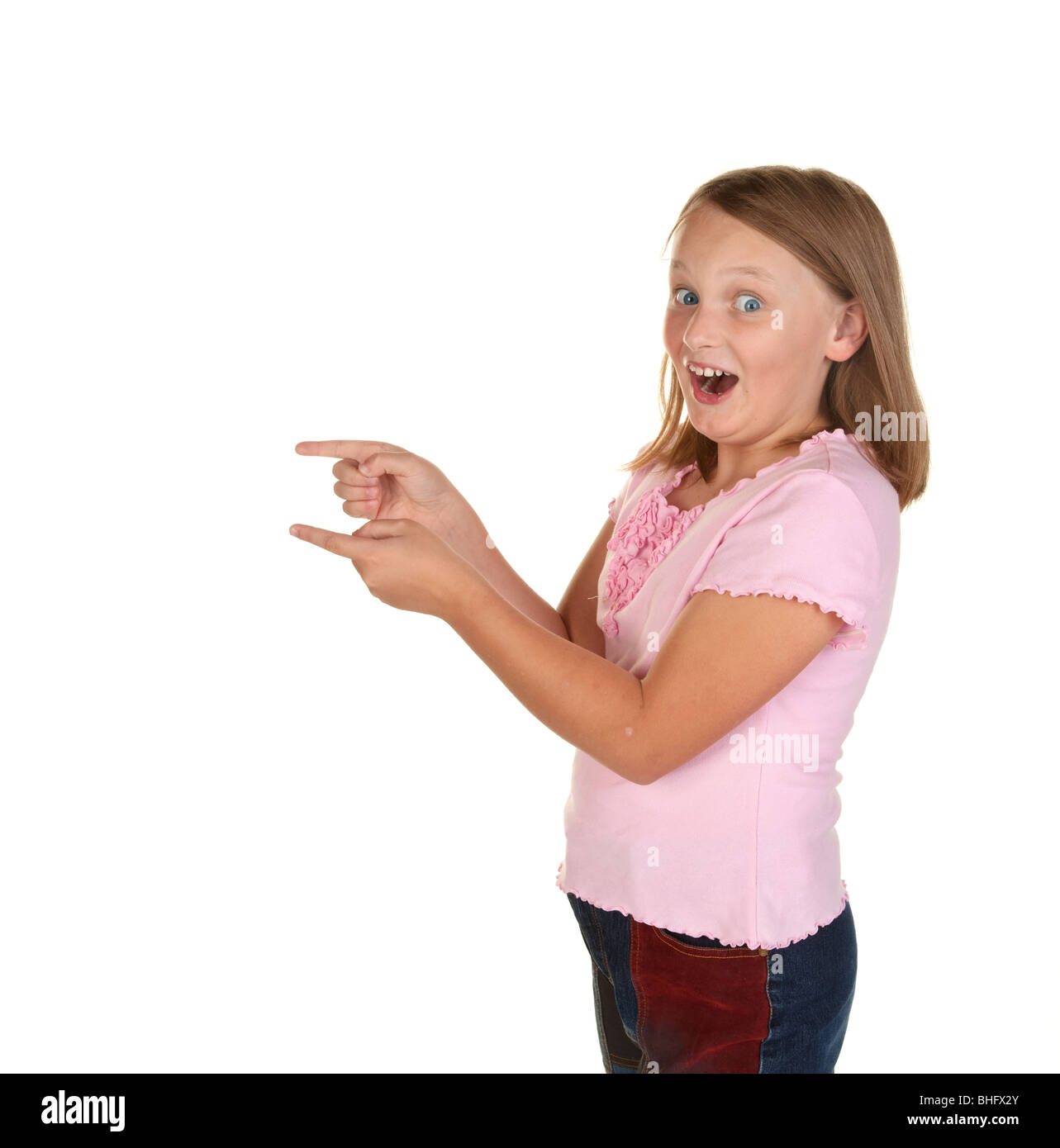 look at this a young girl pointing to something exciting Stock Photo ...