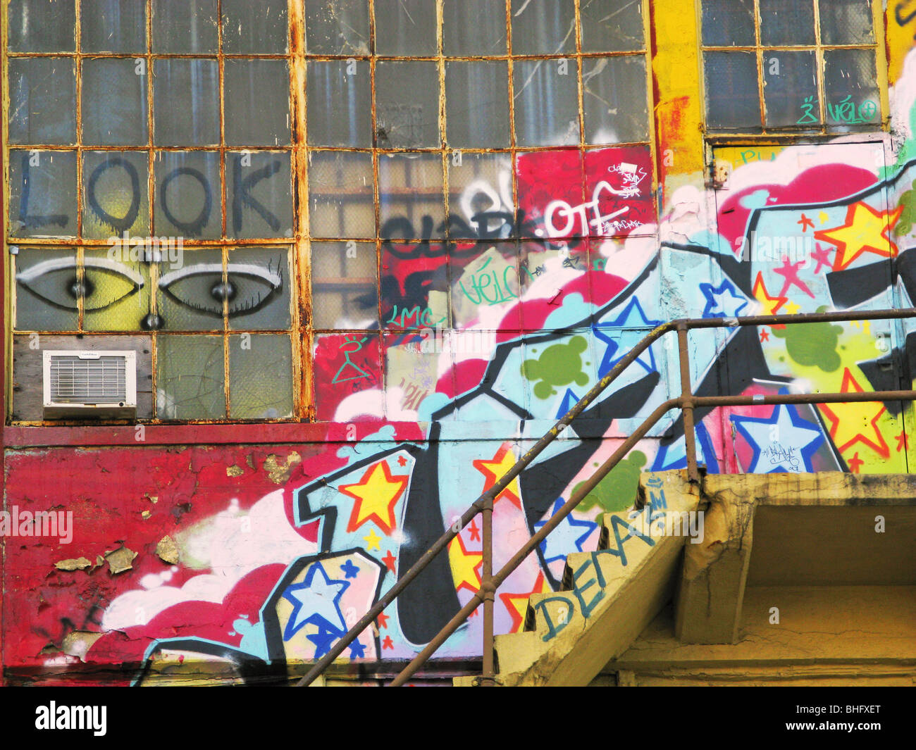 Old brick building with graffiti doors hi-res stock photography and ...
