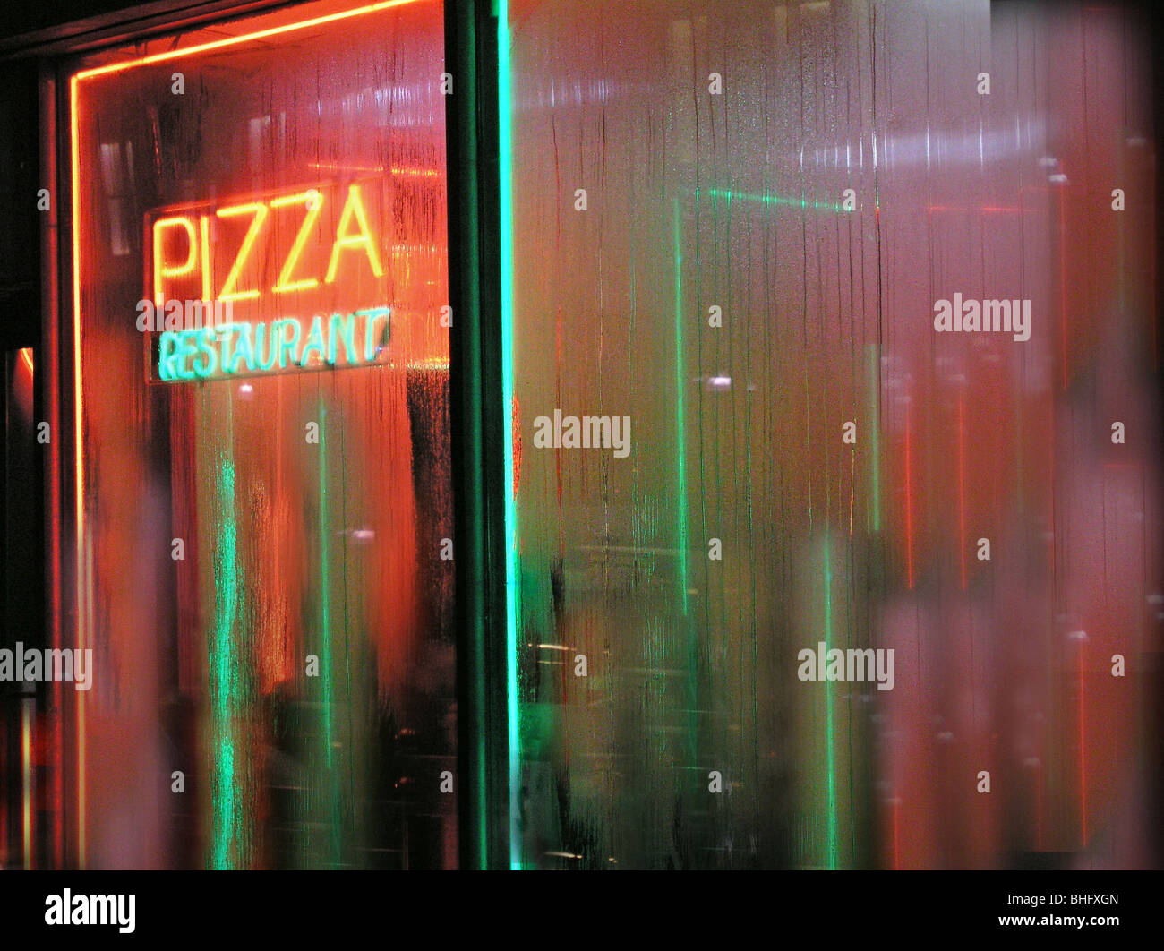 neon pizza restaurant sign Stock Photo - Alamy